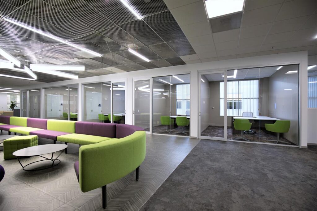 Mello Loan Depot Receiving Area with green and purple sofa | Alpha ...
